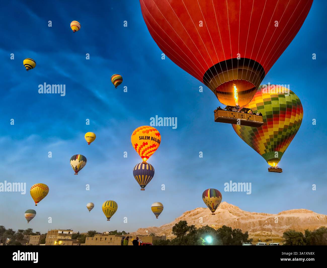 Hot air balloons take off for early morning sunrise hot air balloon ...