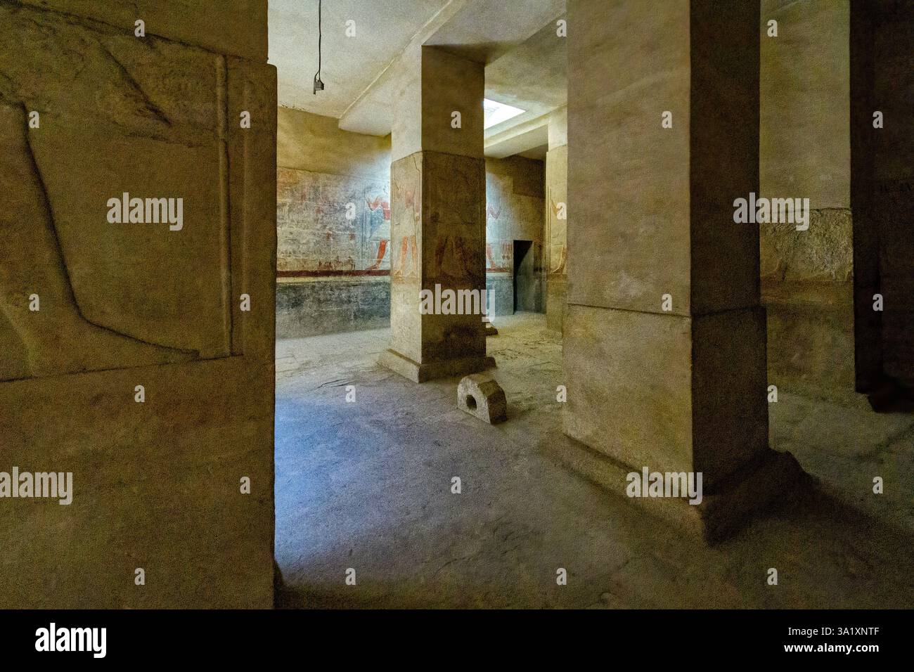 Staple stone embedded in the floor between two pillars in the cult hall ...