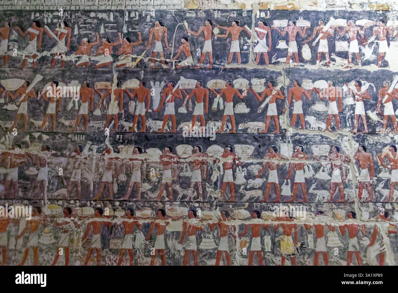 A long procession of men bearing offerings bringing the produce from ...