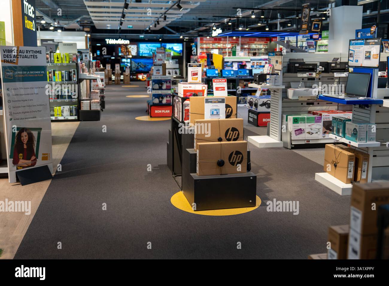 Modern retail environment showcasing tech products in a spacious store ...