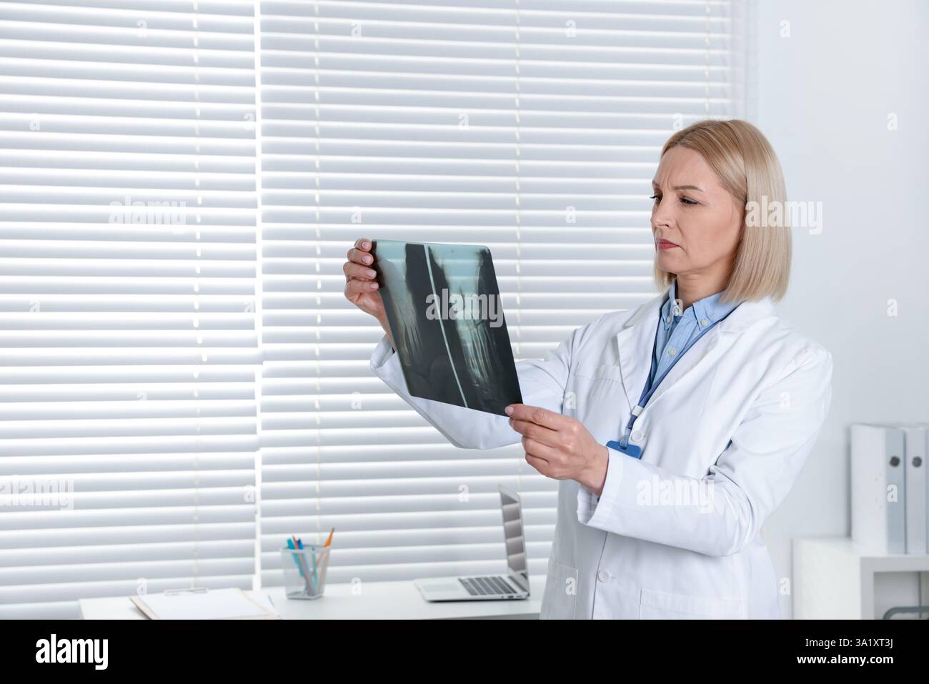 Doctor examining foot x-ray in clinic, space for text Stock Photo - Alamy