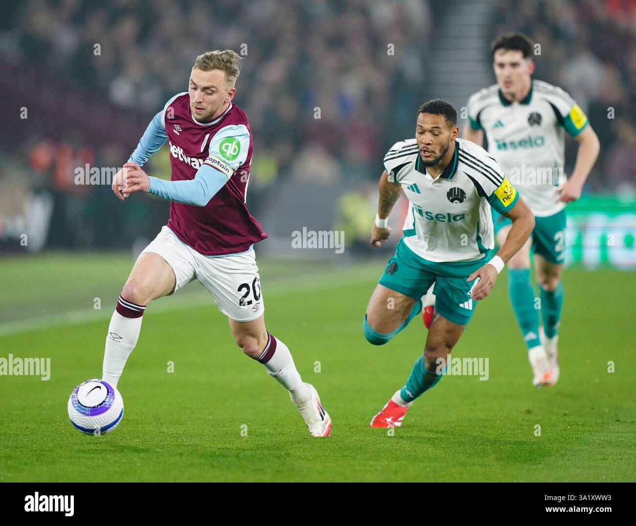 West Ham United's Jarrod Bowen and Newcastle United's Joelinton (right ...