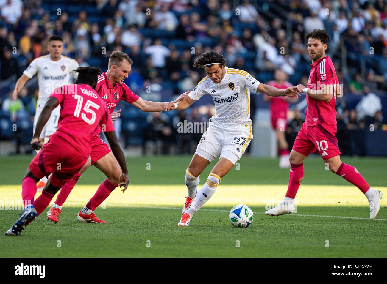 Los Angeles Galaxy forward Miguel Berry (27) is defended by St. Louis ...