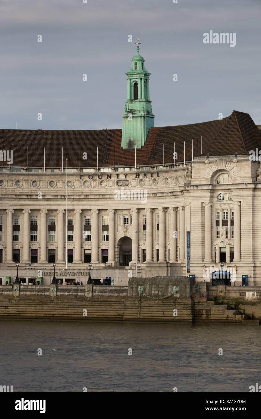 County Hall, London, viewed from the River Thames. A landmark building ...