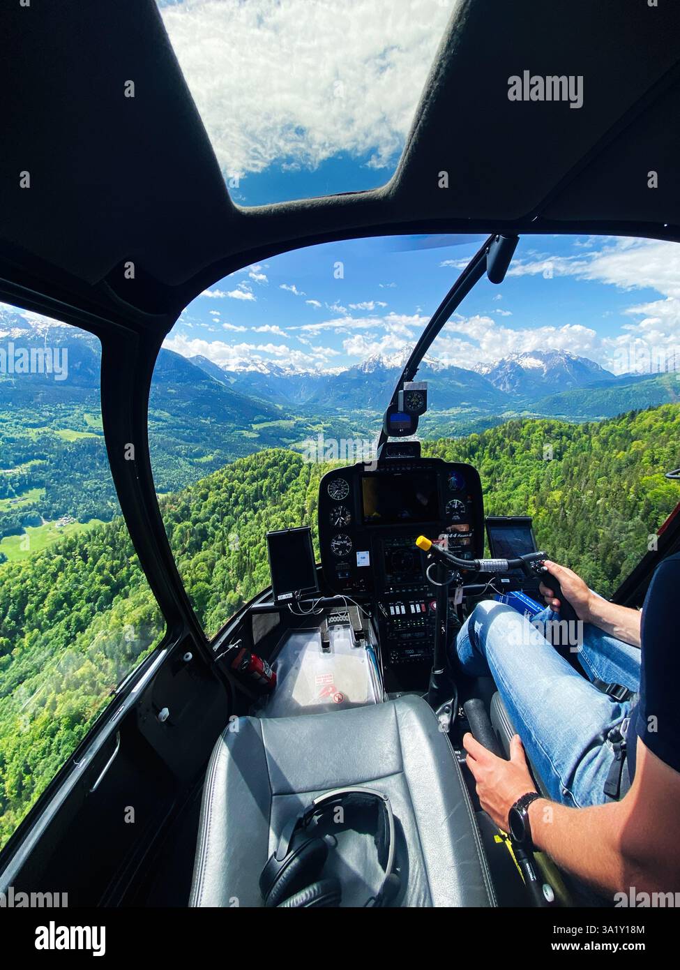 Gosau, Austria - March 10, 2024: A cockpit view of Robinson R44 Raven ...