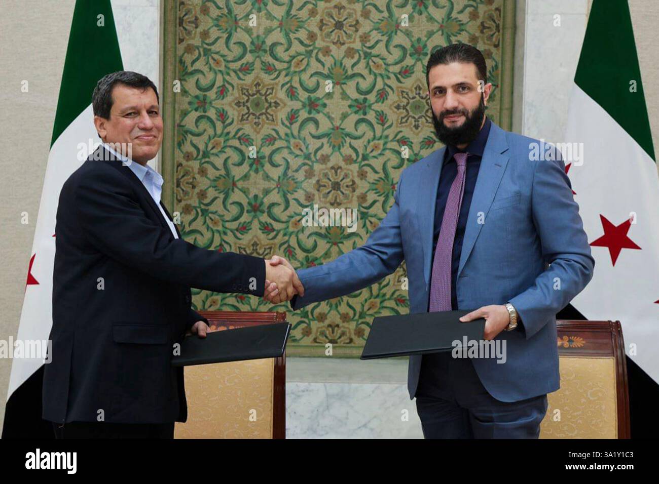 In this photo released by Syrian state news agency SANA, Syria's ...