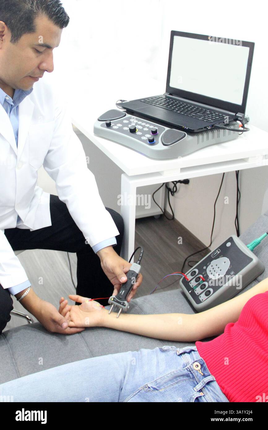 Dark-skinned Latino neurologist specialist doctor performs ...