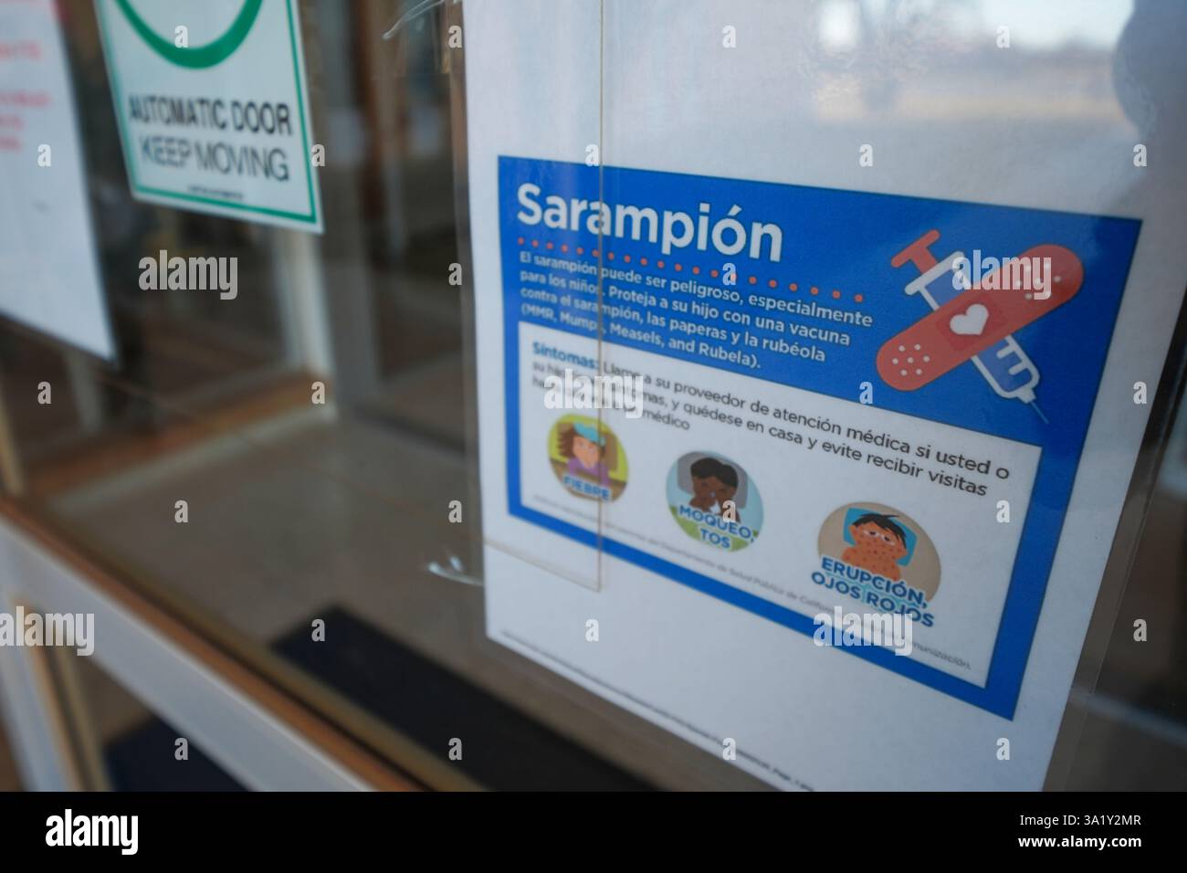 A measles sign is seen in Spanish outside Brownfield Regional Medical ...