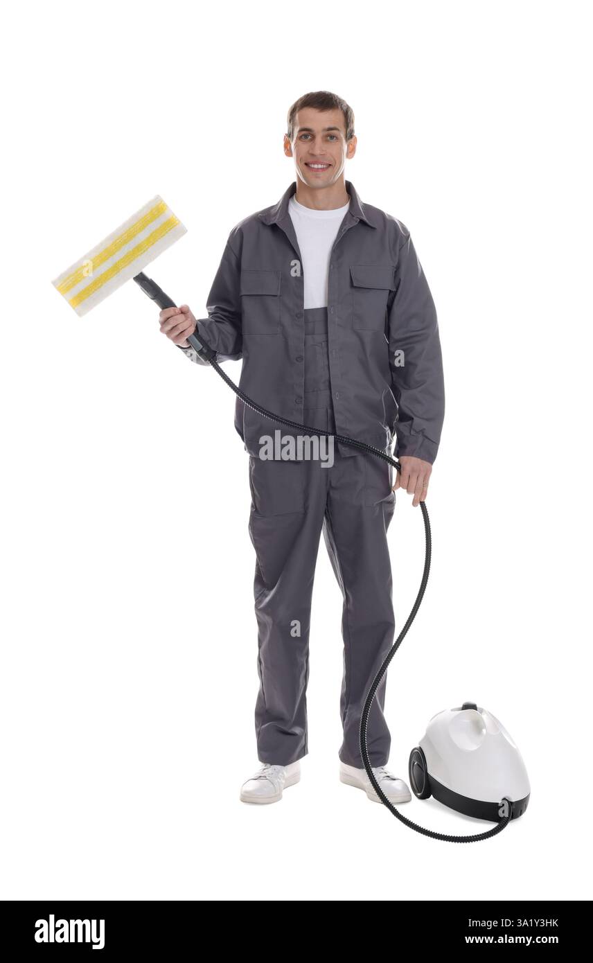 Smiling cleaning service worker with steam cleaner on white background ...
