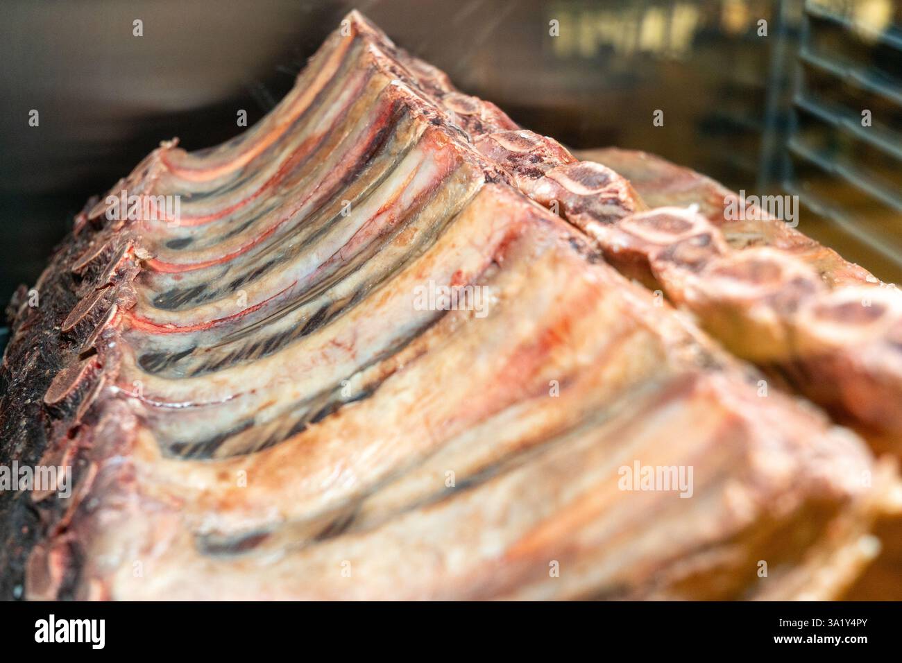 Marbled beef dry aging lies in the refrigerator in a restaurant. Dry ...