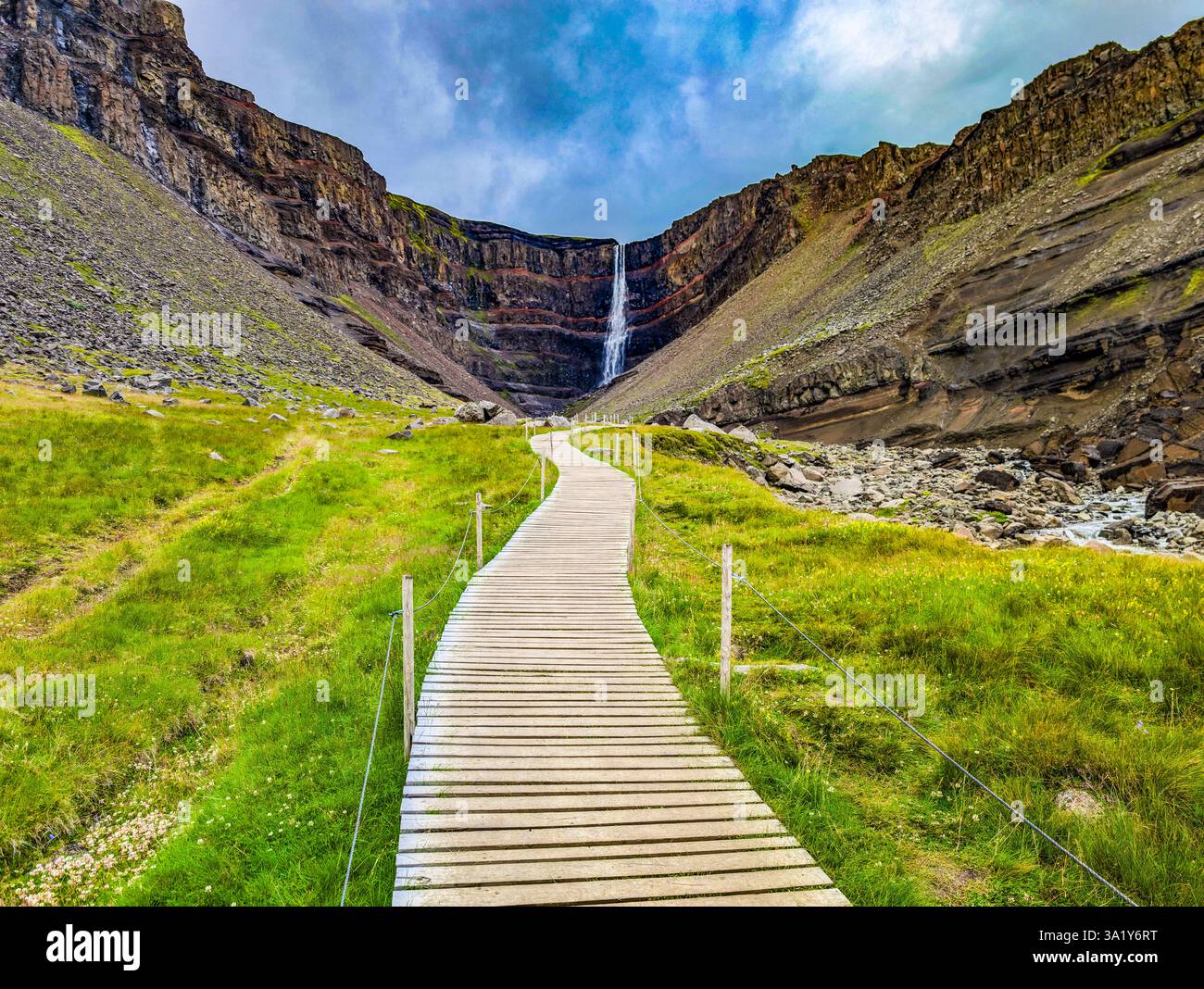 Aerial drone view of Hengifoss waterfall landscape in Iceland. Red ...