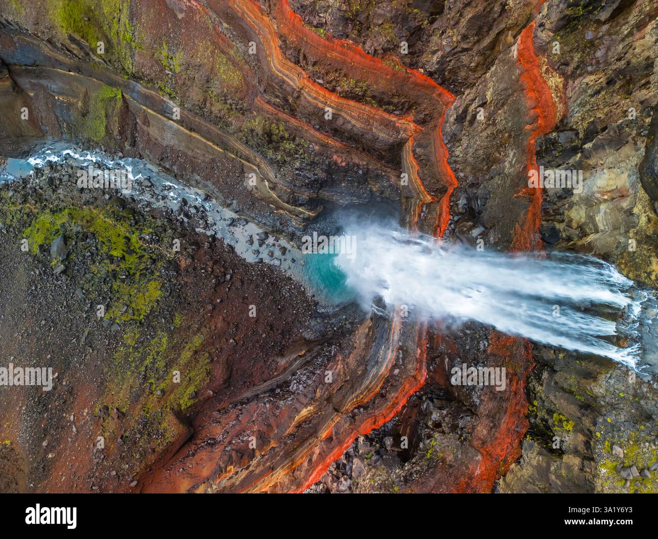 Aerial drone view of Hengifoss waterfall landscape in Iceland. Red ...