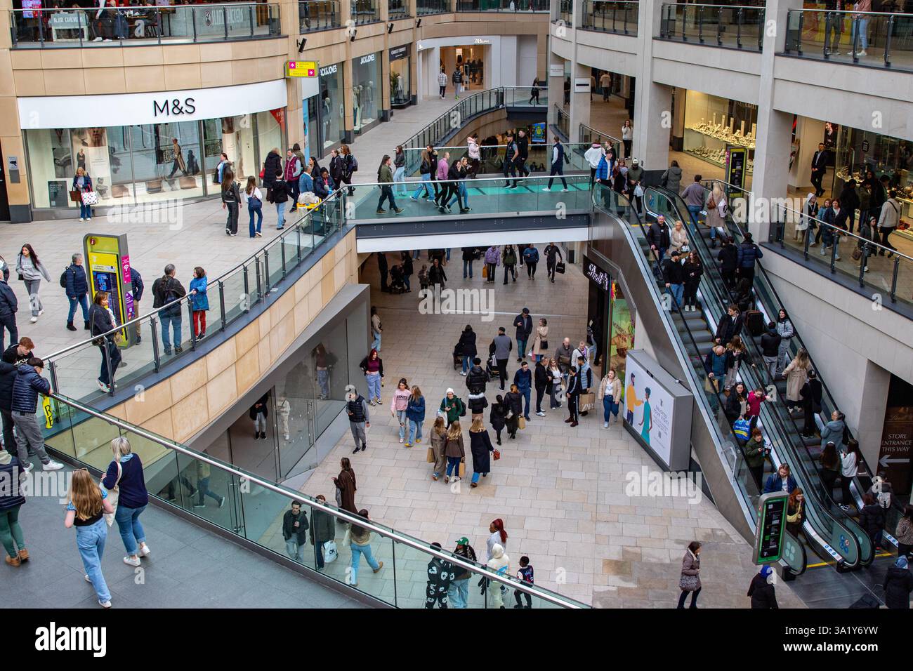 Elevated view of a multi-level indoor shopping mall with numerous ...