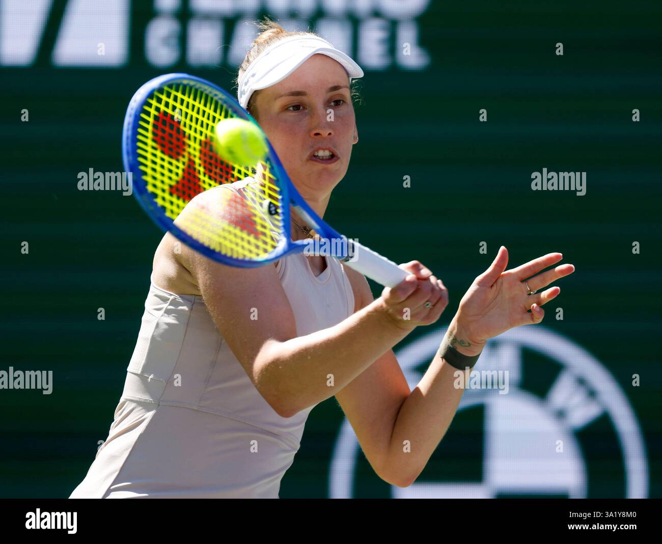 March 10, 2025 Elise Mertens (BEL) returns a shot against Madison Keys ...