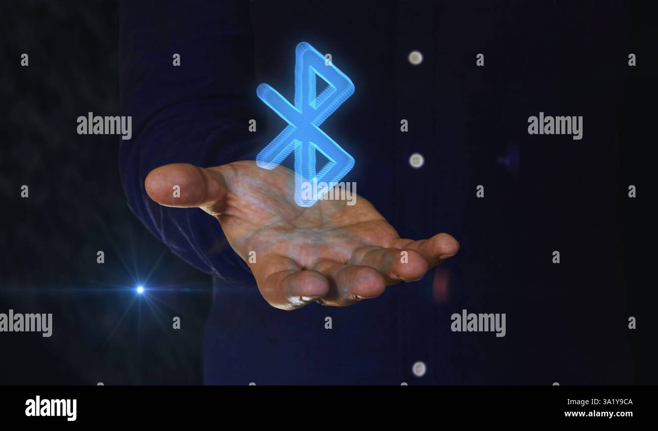 Bluetooth mobile device wireless connection 3d symbol over man hand ...