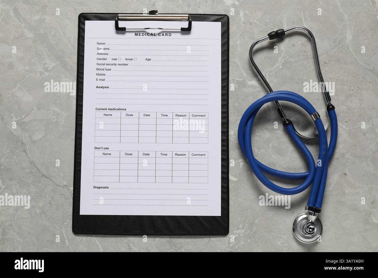 Medical card form and stethoscope on grey background, top view Stock ...