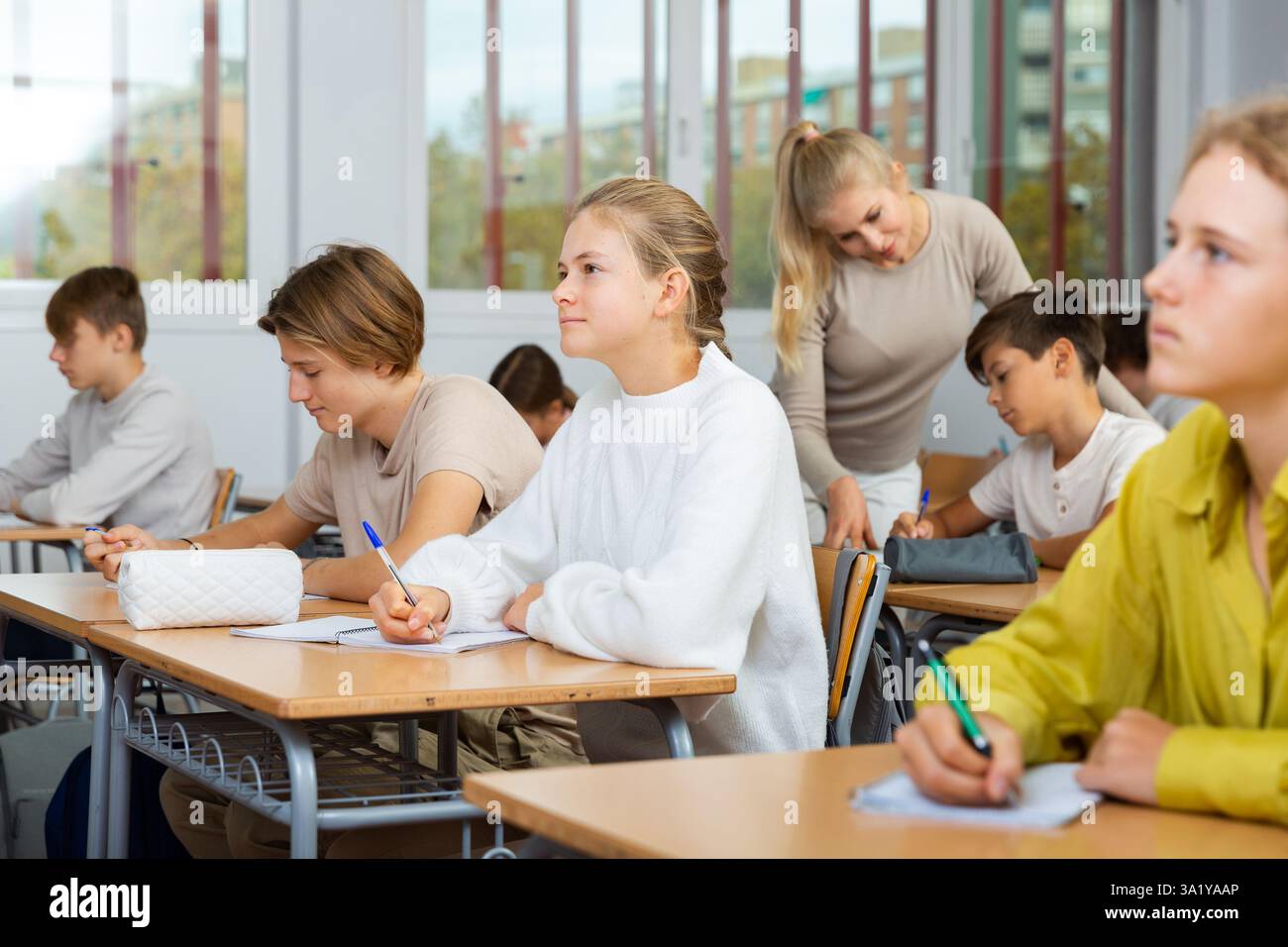 Student is sitting test and answer about task in classroom Stock Photo ...