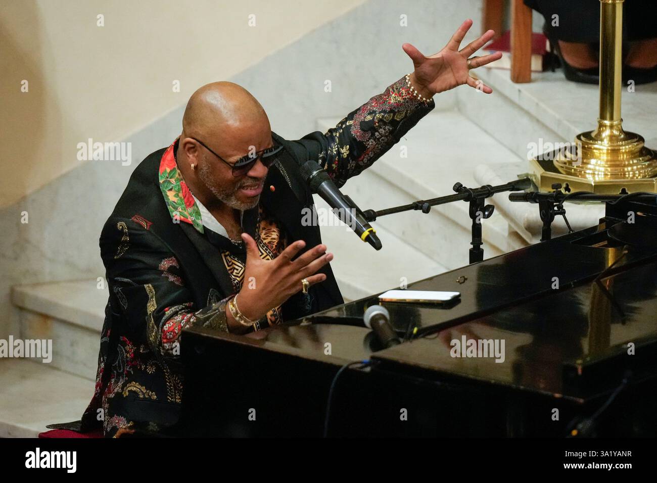 Davell Crawford performs during a ceremony in celebration of Roberta ...