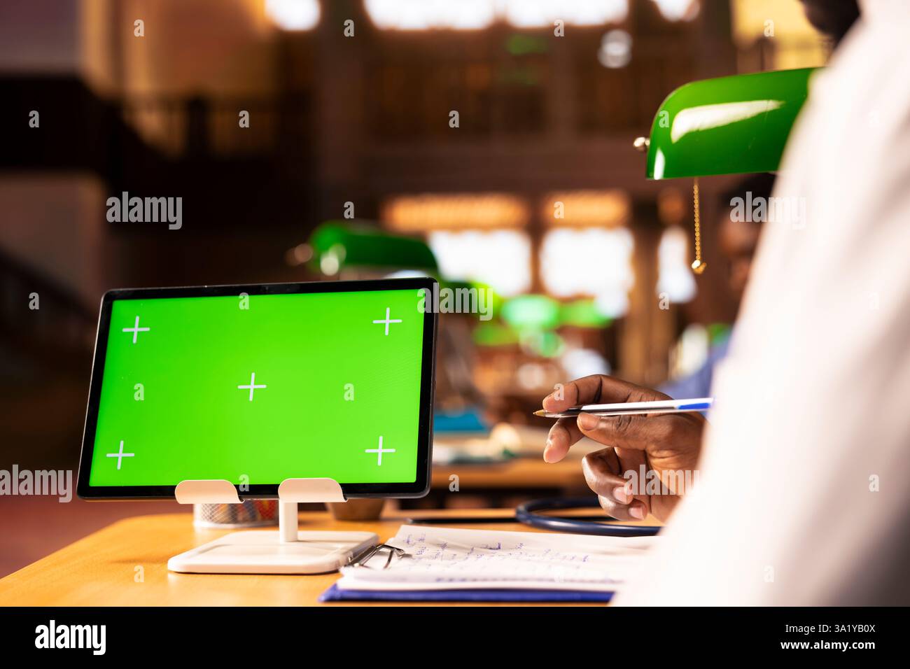 Future healthcare professional studying medical methods next to chroma ...