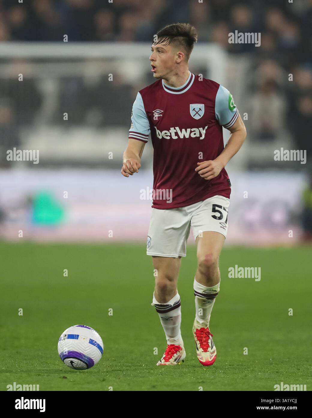 Oliver Scarles of West Ham United makes a break with the ball during ...