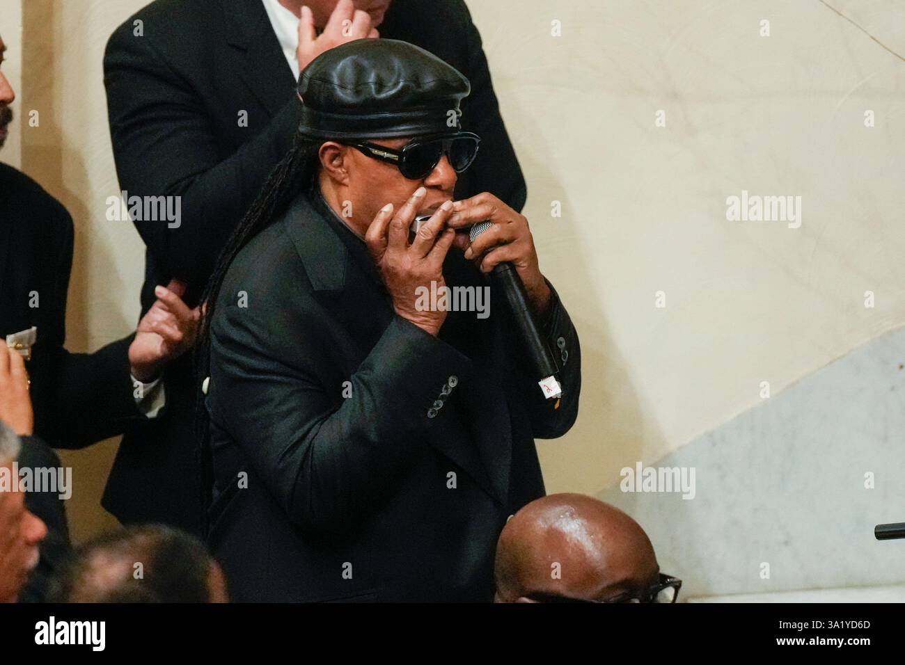 Stevie Wonder performs during a ceremony in celebration of Roberta ...