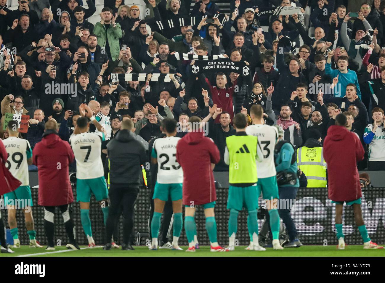 travelling fans applaud the Newcastle players at the end of the Premier ...