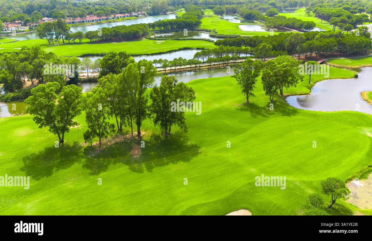 Aerial view of a golf course with trees, ponds, and wide fairways Stock ...