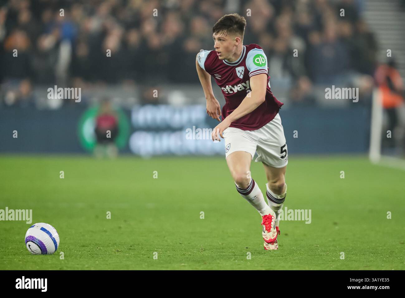 Oliver Scarles of West Ham United makes a break with the ball during ...