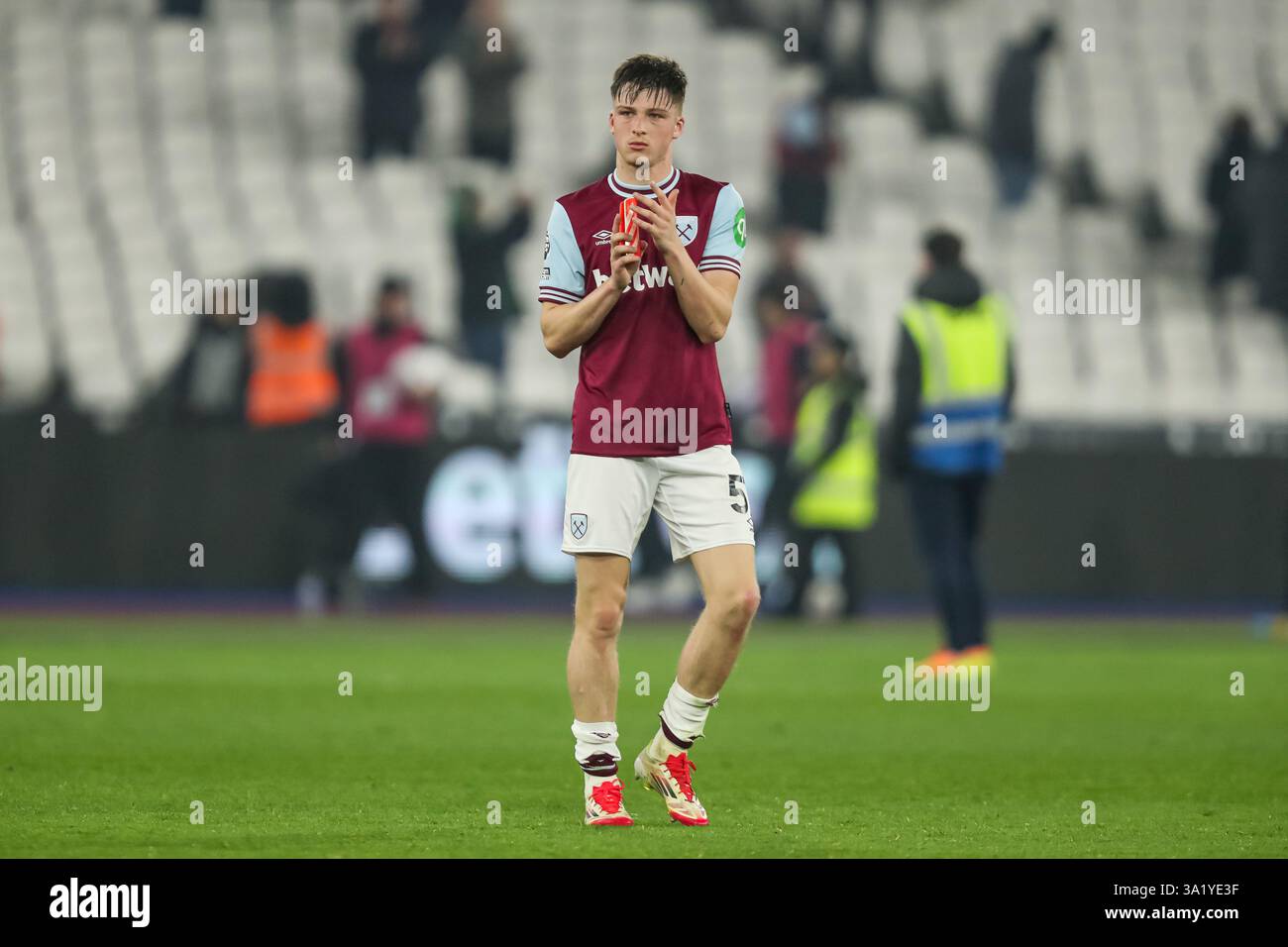 Oliver Scarles of West Ham United applauds the fans at the end of the ...