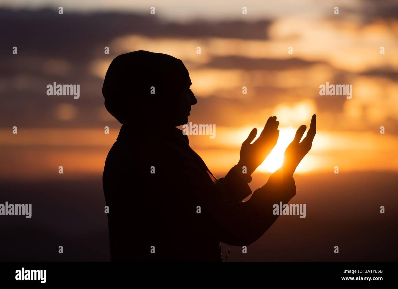 Muslim woman prayer having worship and praying with hands open doing ...