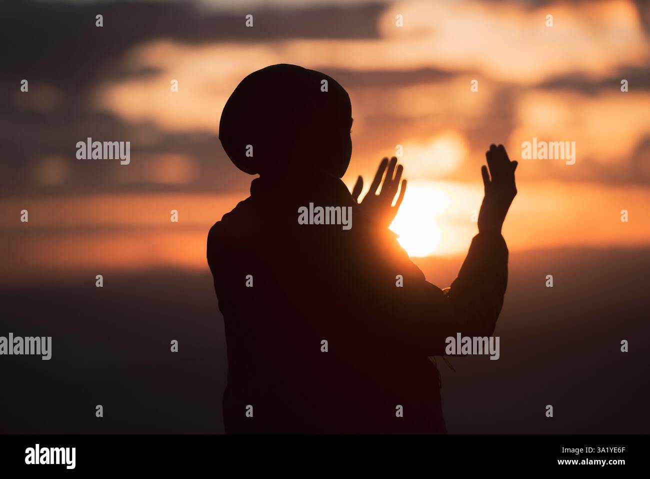 Muslim woman prayer having worship and praying with hands open doing ...