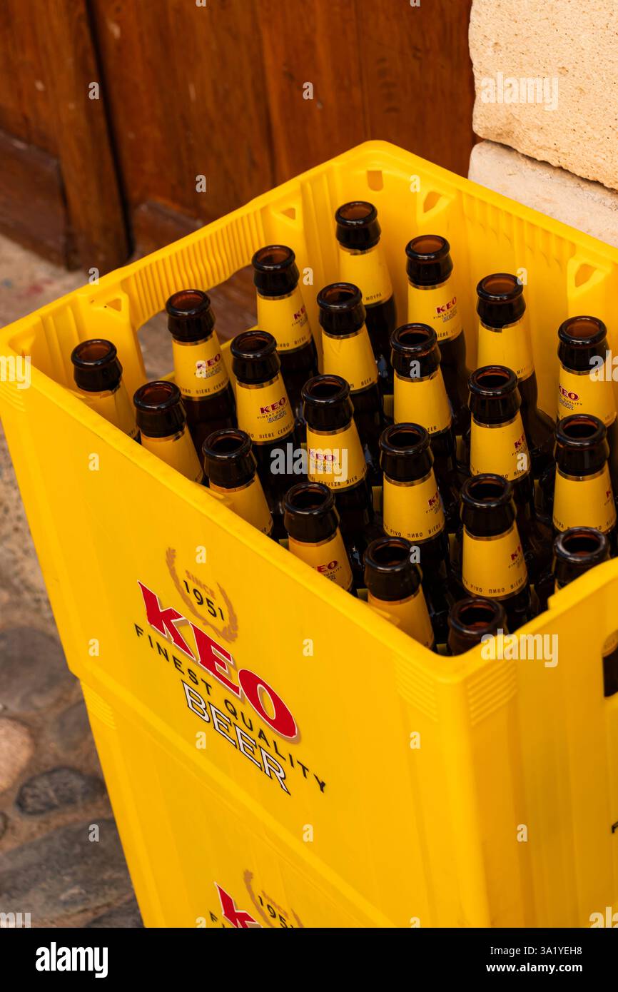 Limassol, Cyprus- December 20, 2025: KEO beer empty glass bottles in ...