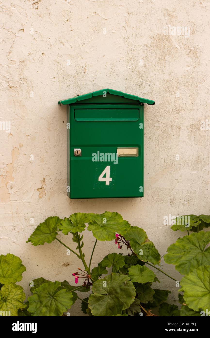 House number 4 (four) on mail box Stock Photo - Alamy