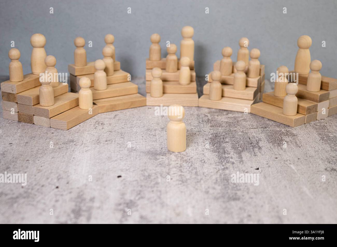 concept scene - one red pawn on base in front of many various pawns on ...