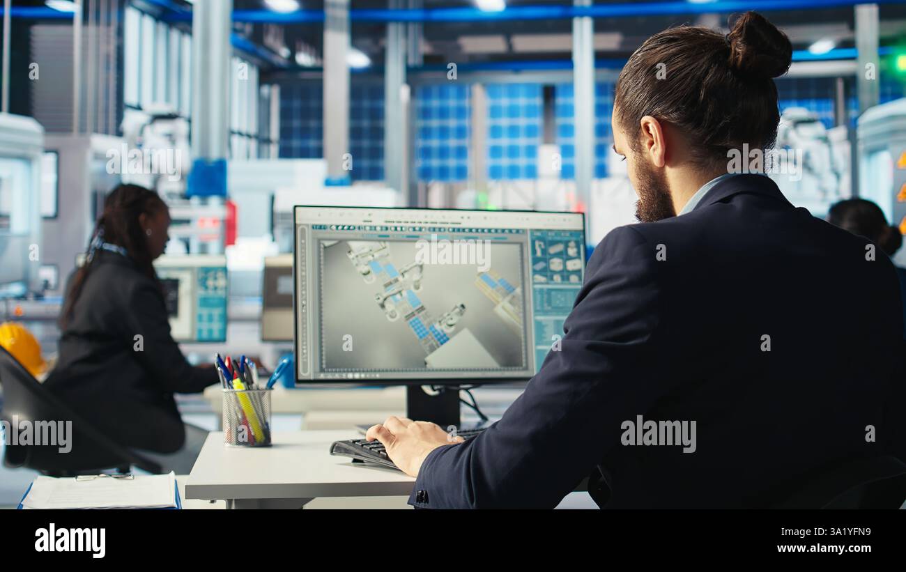 Photovoltaics factory engineer looking over paperwork documents, analyzing data. Solar panels ...
