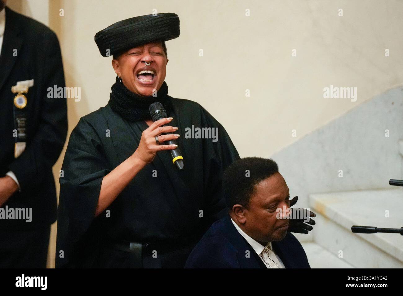Lisa Fischer, left, and Shelton Becton perform during a ceremony in ...