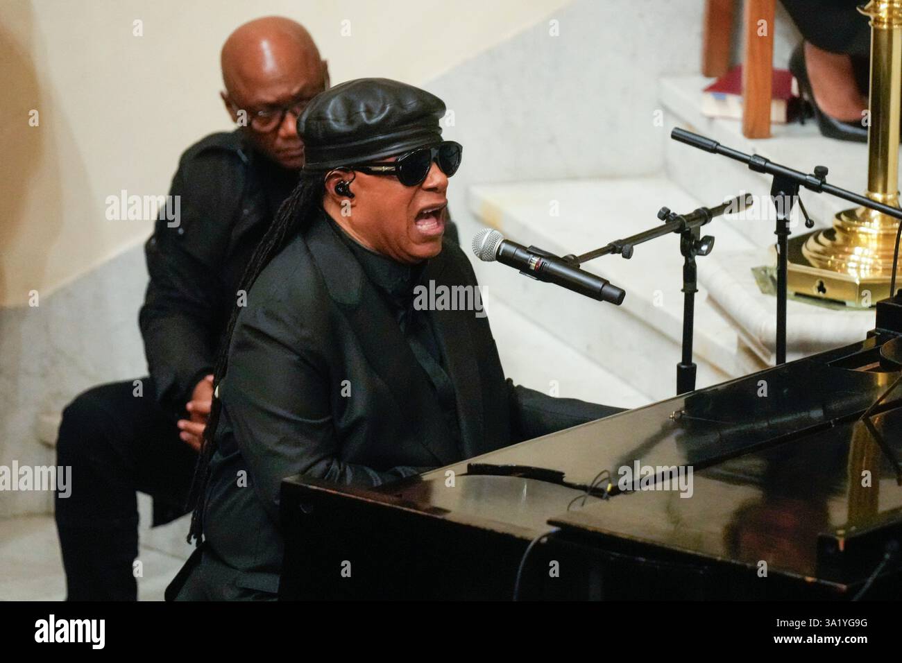 Stevie Wonder performs during a ceremony in celebration of Roberta ...