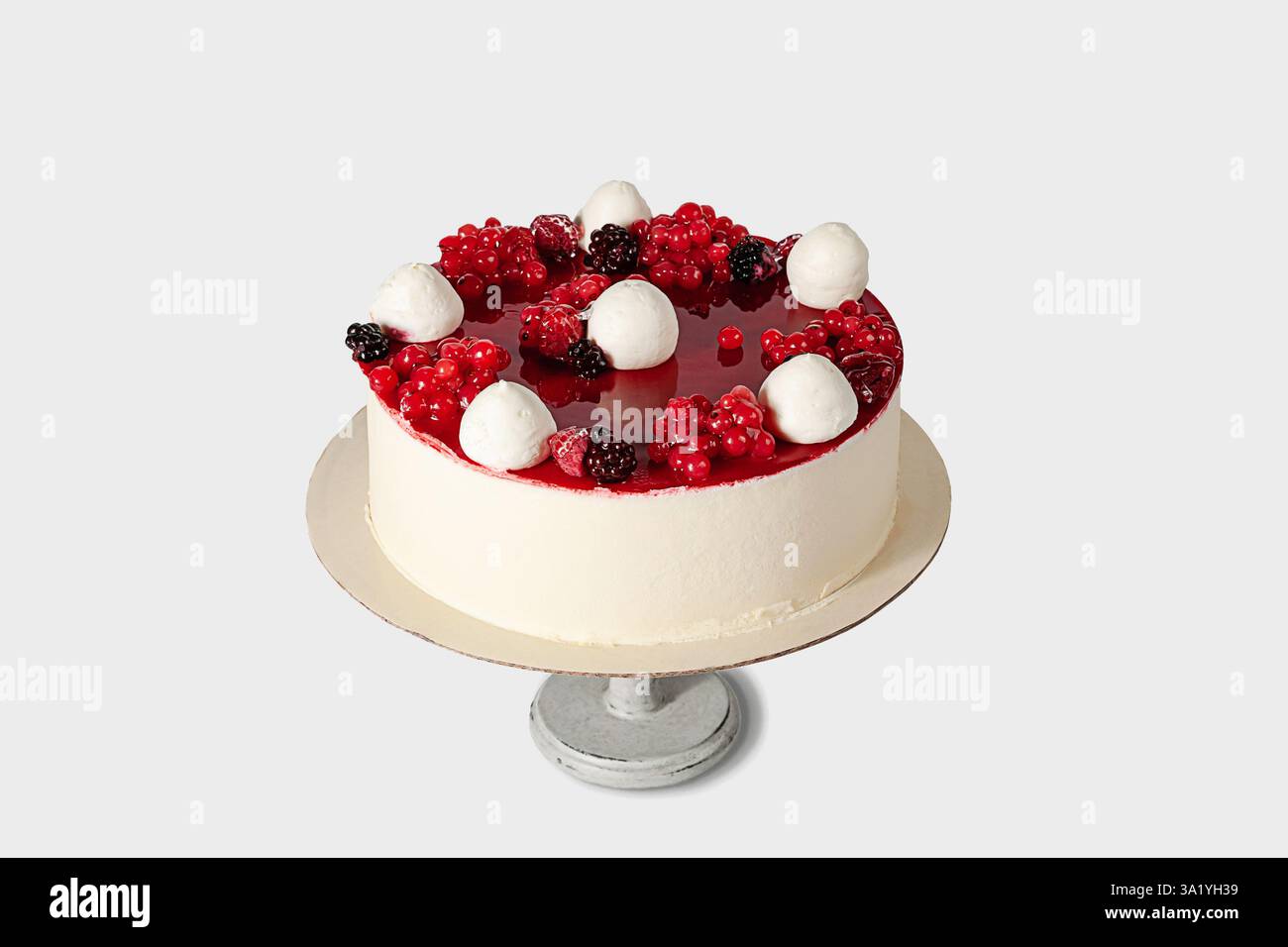 Bright, beautiful red berry cake lying on a cake stand. Isolated image ...