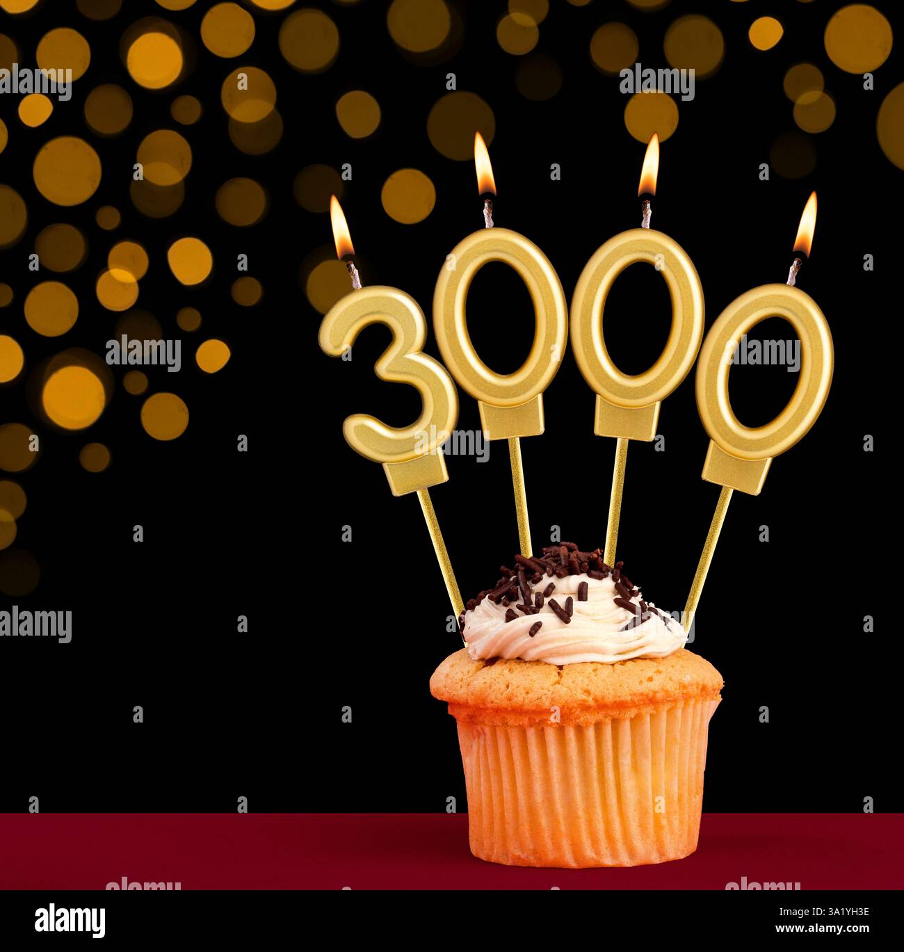 Number 3000 birthday candle - Cupcake on black background with out of ...