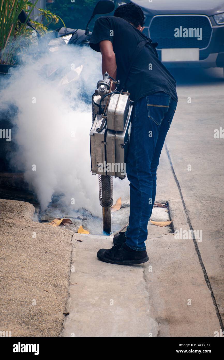 People fogging DDT spray for mosquito kill and protect by control ...