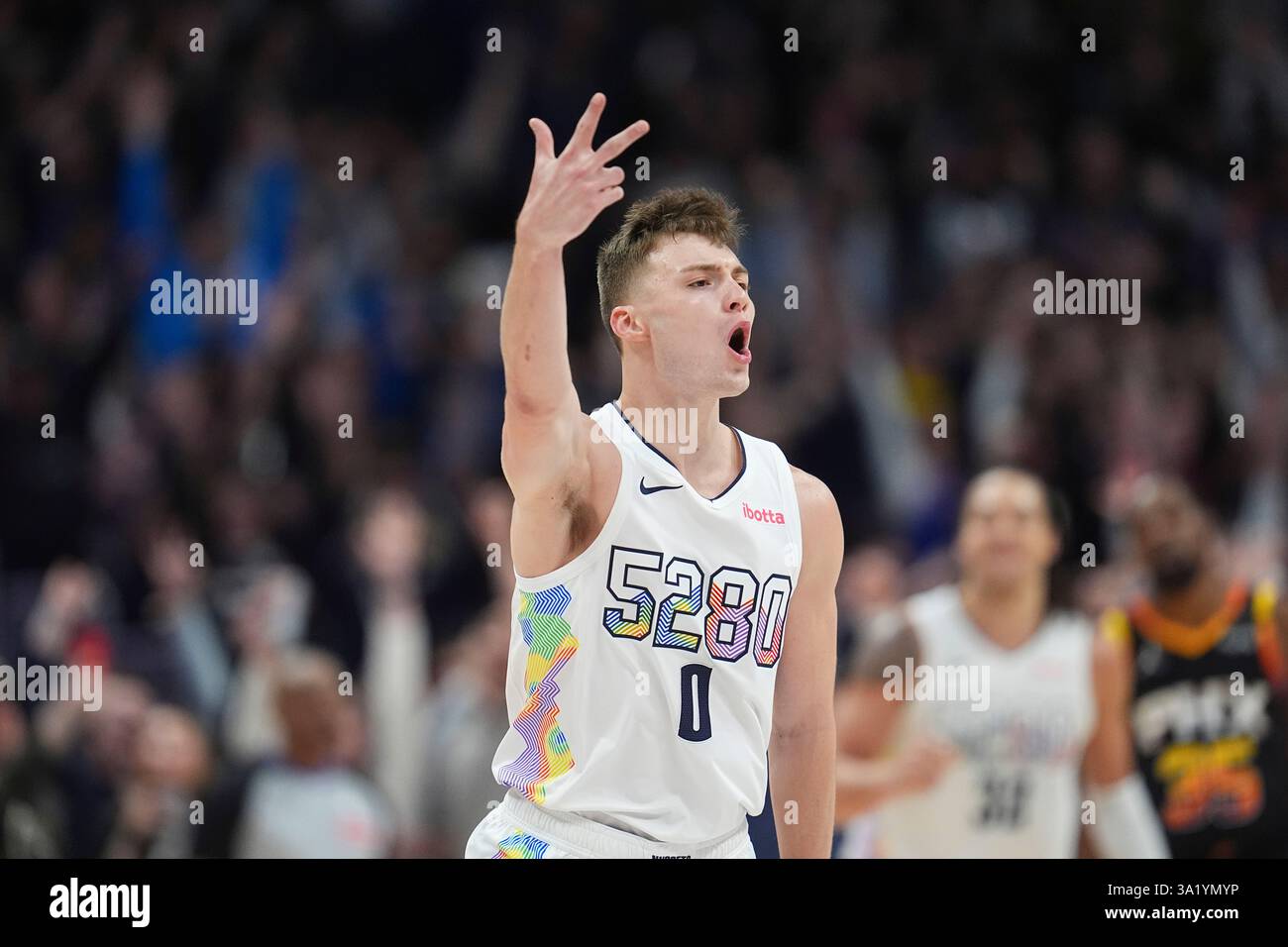 Denver Nuggets guard Christian Braun (0) reacts after hitting a 3-point ...