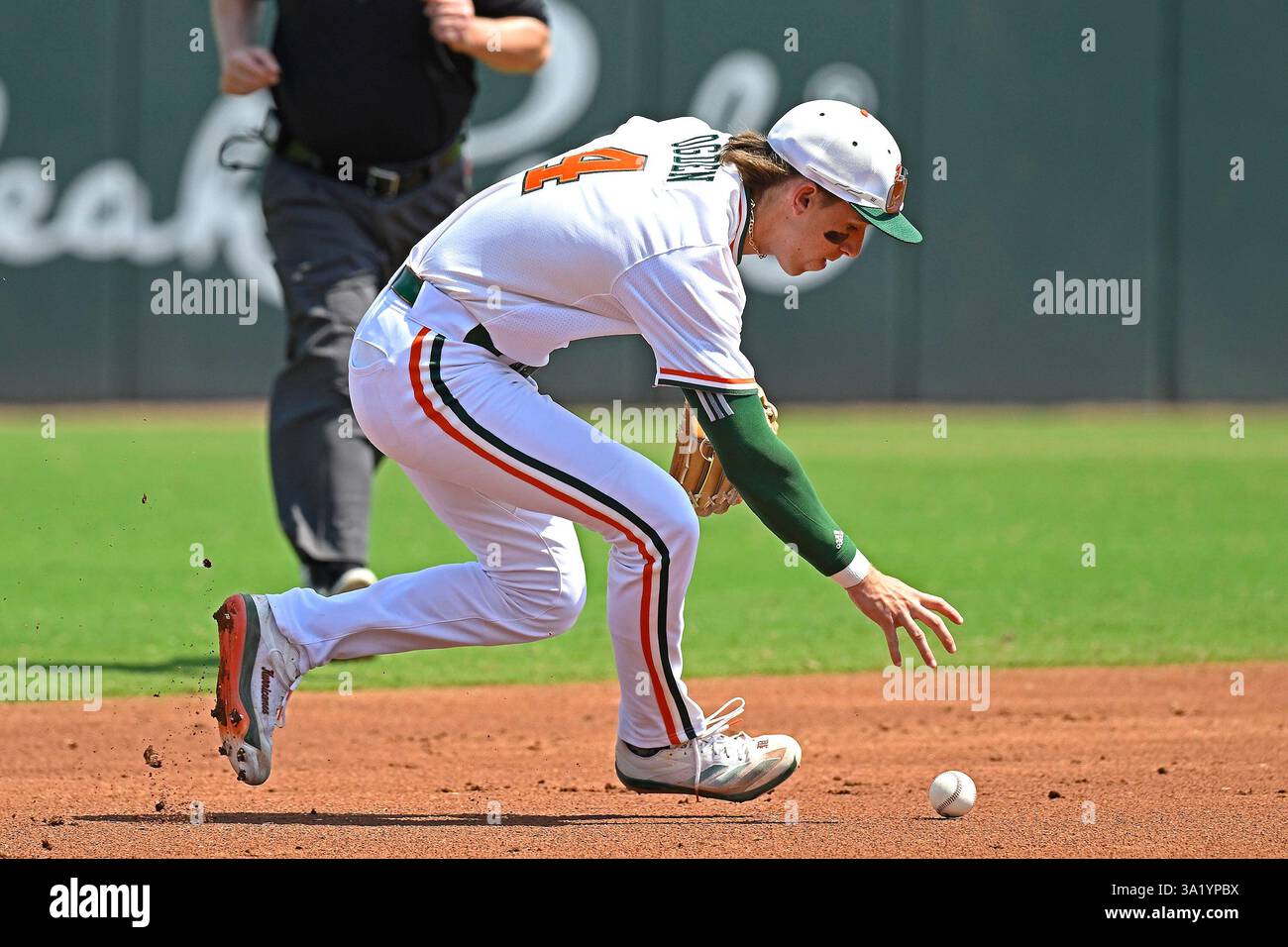 CORAL GABLES, FL - MARCH 09: Miami infielder Jake Ogden (4) fields a ...