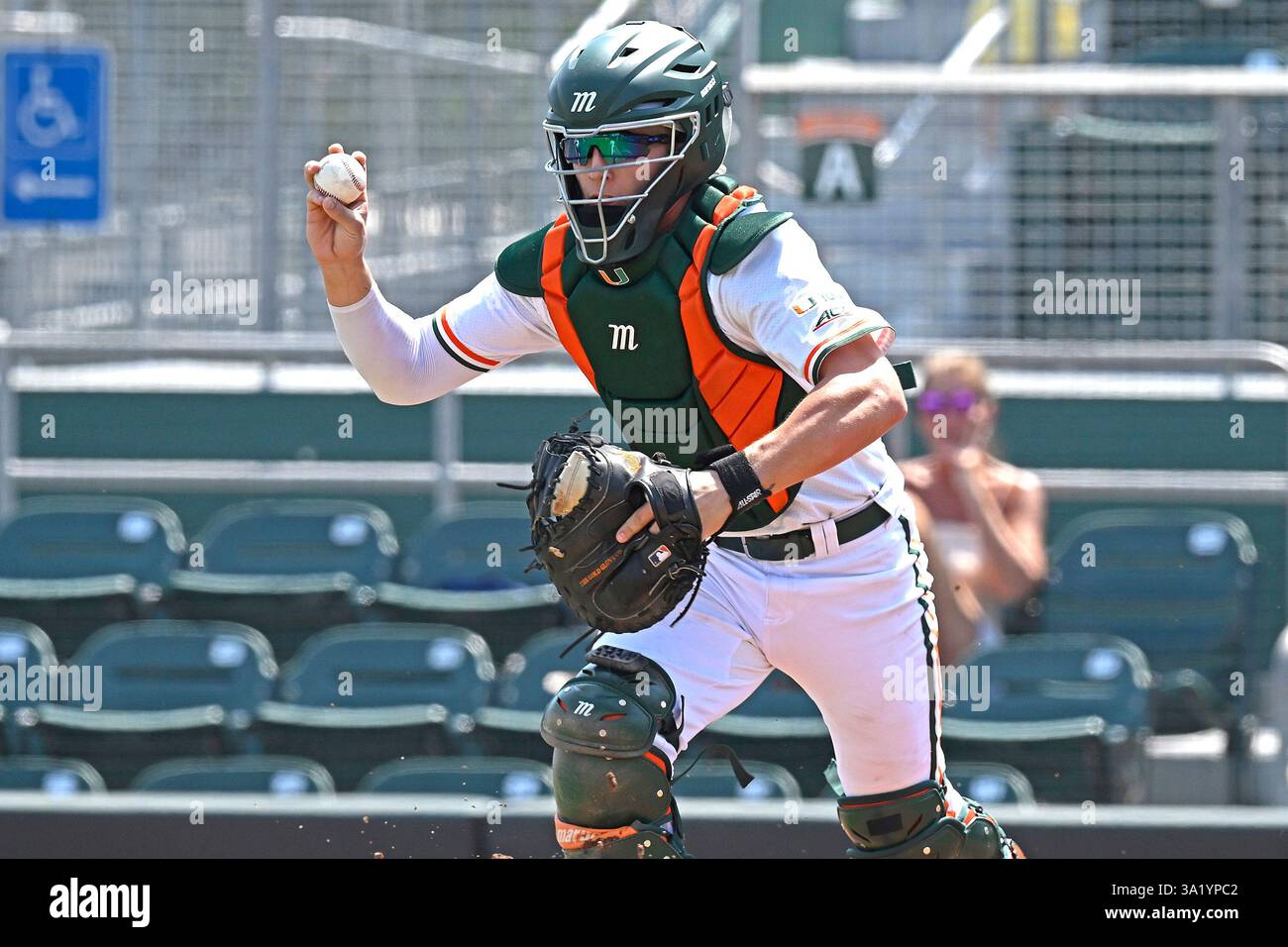 CORAL GABLES, FL - MARCH 09: Miami catcher Tanner Smith (30) chases ...