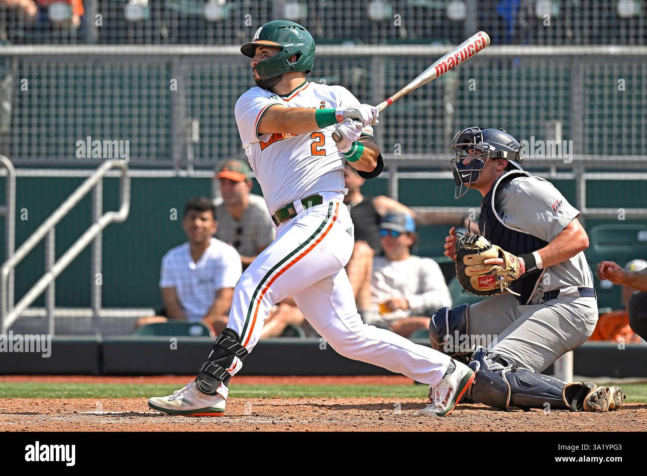 CORAL GABLES, FL - MARCH 09: Miami outfielder Derek Williams (2) bats ...