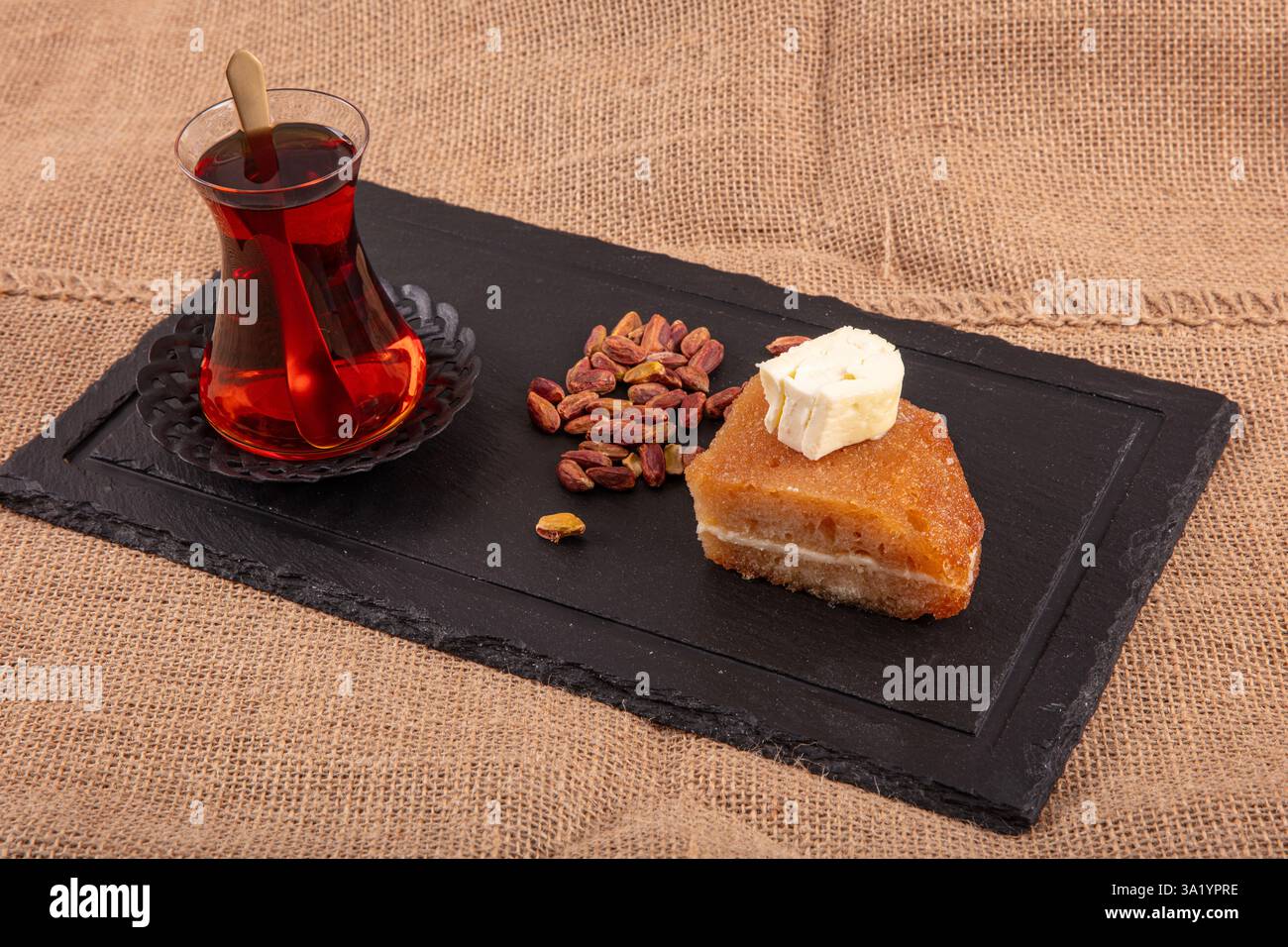 dessert of baked bread dough soaked in sugar syrup, served with fresh ...