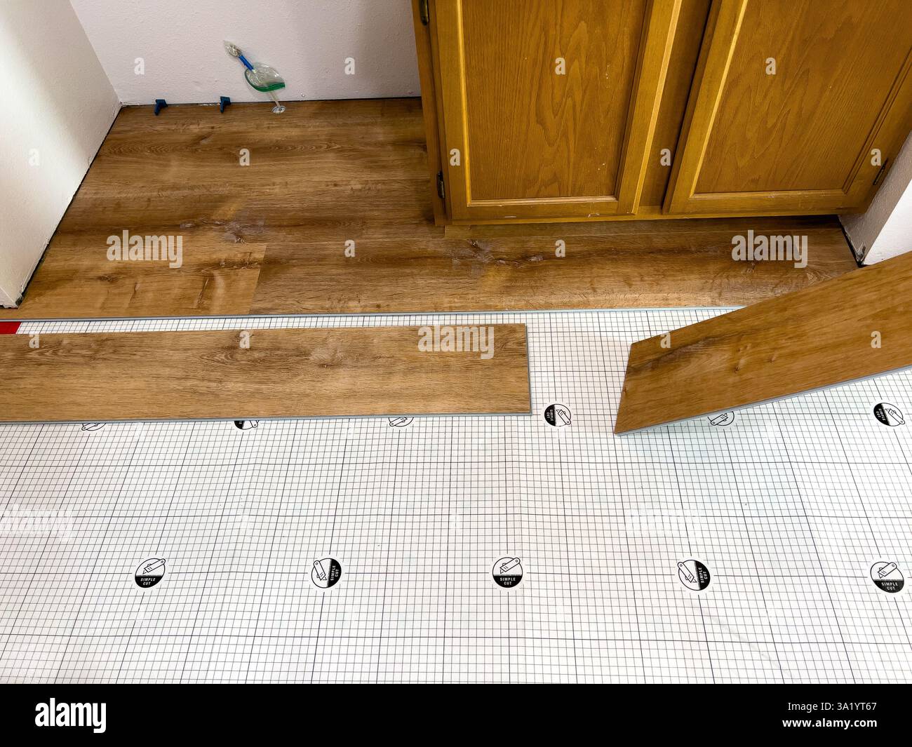 Kitchen Floor Installation With Underlayment Visible Stock Photo - Alamy