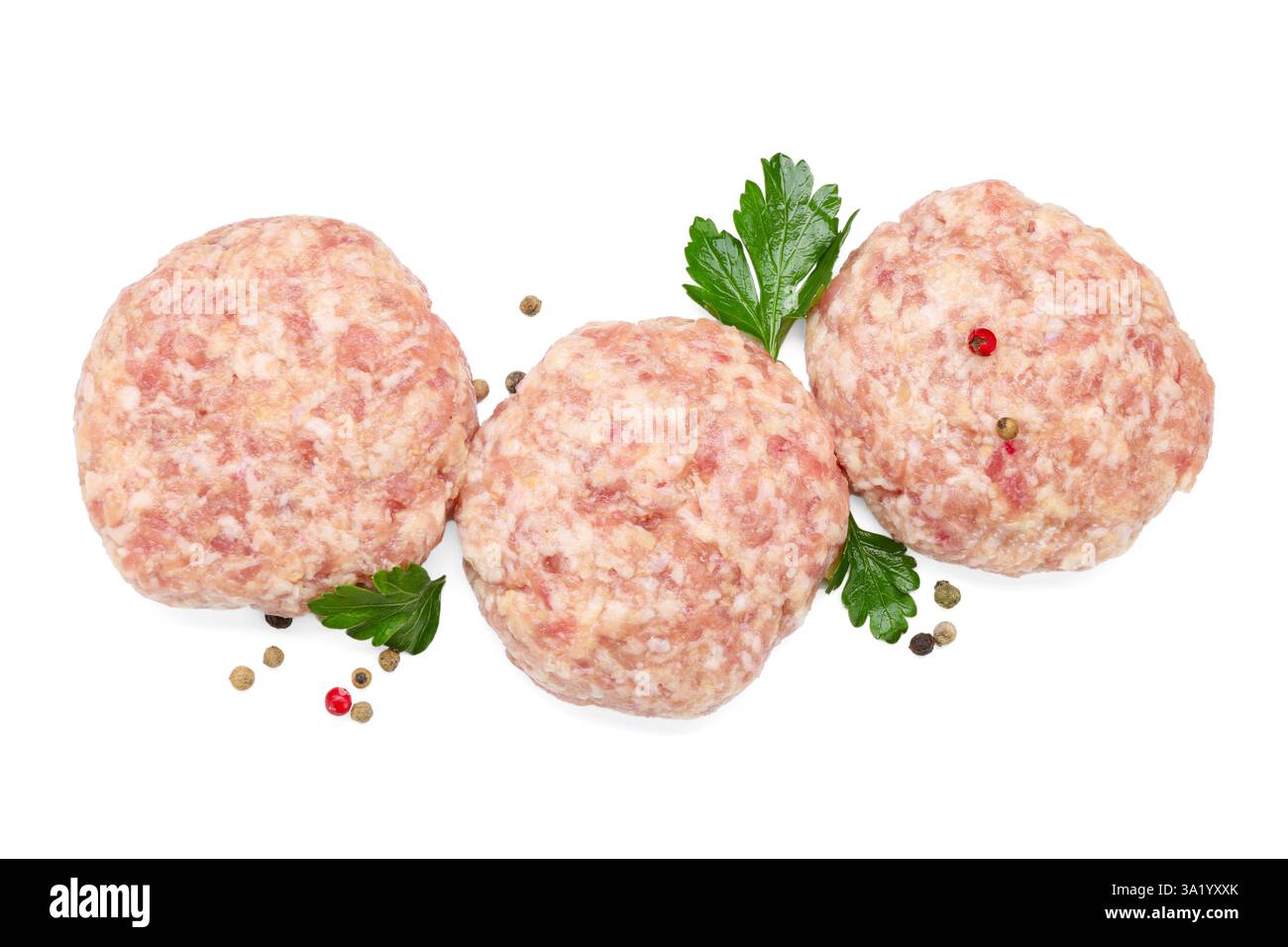 Three uncooked patties and spices isolated on white, top view Stock ...