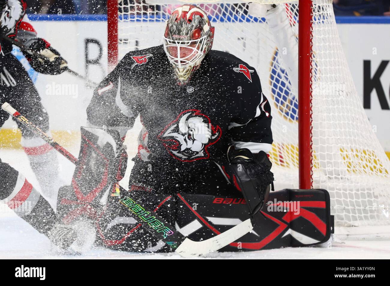 Buffalo Sabres goaltender Ukko-Pekka Luukkonen (1) looks for the puck ...