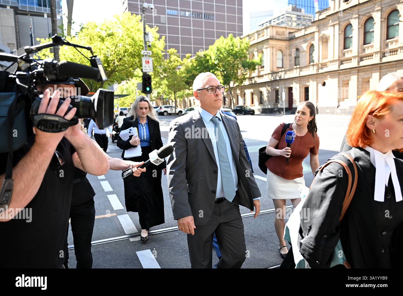Robert Italiano departs (centre) departs from the County Court of ...