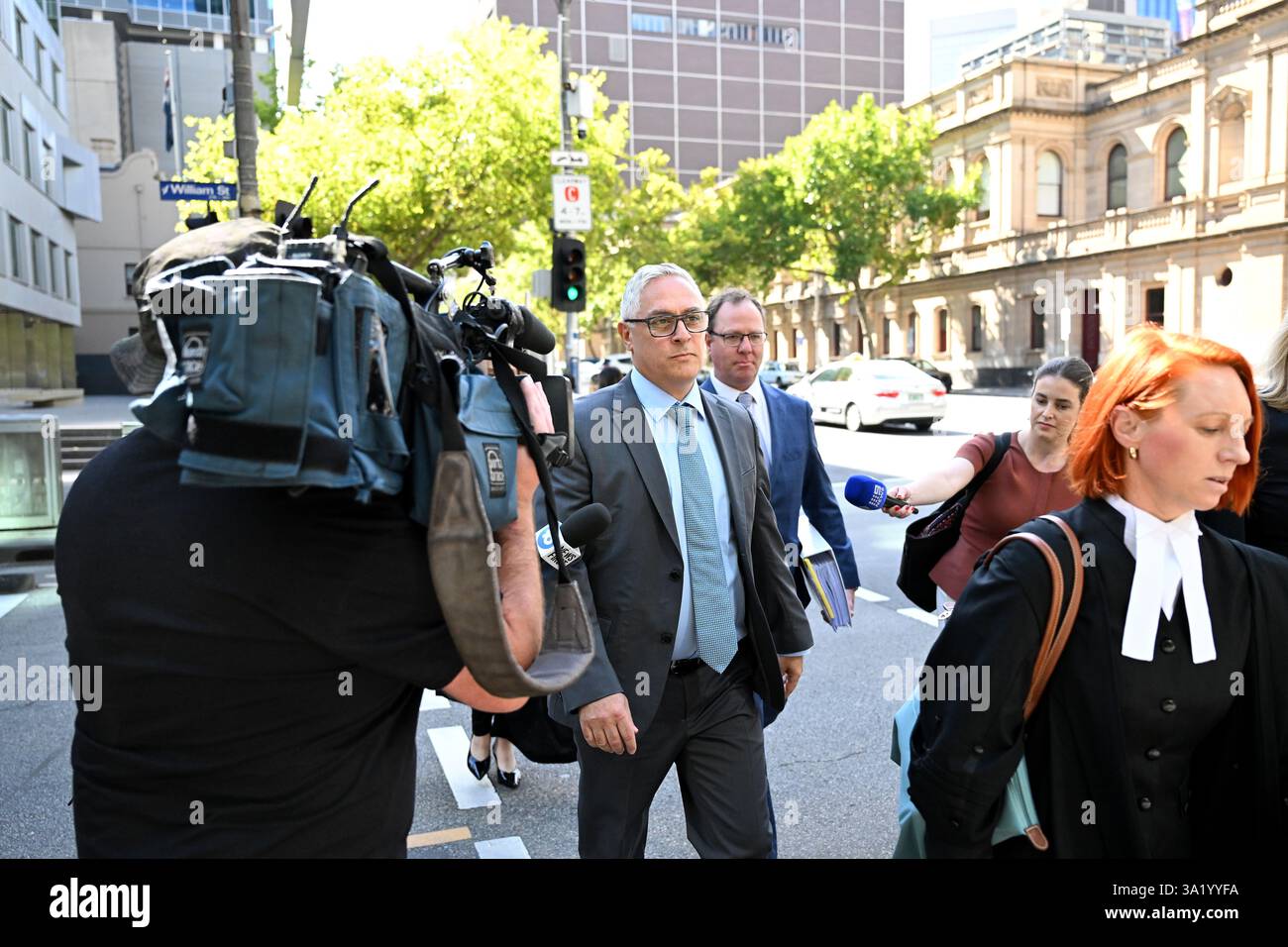 Robert Italiano departs (left) departs from the County Court of ...